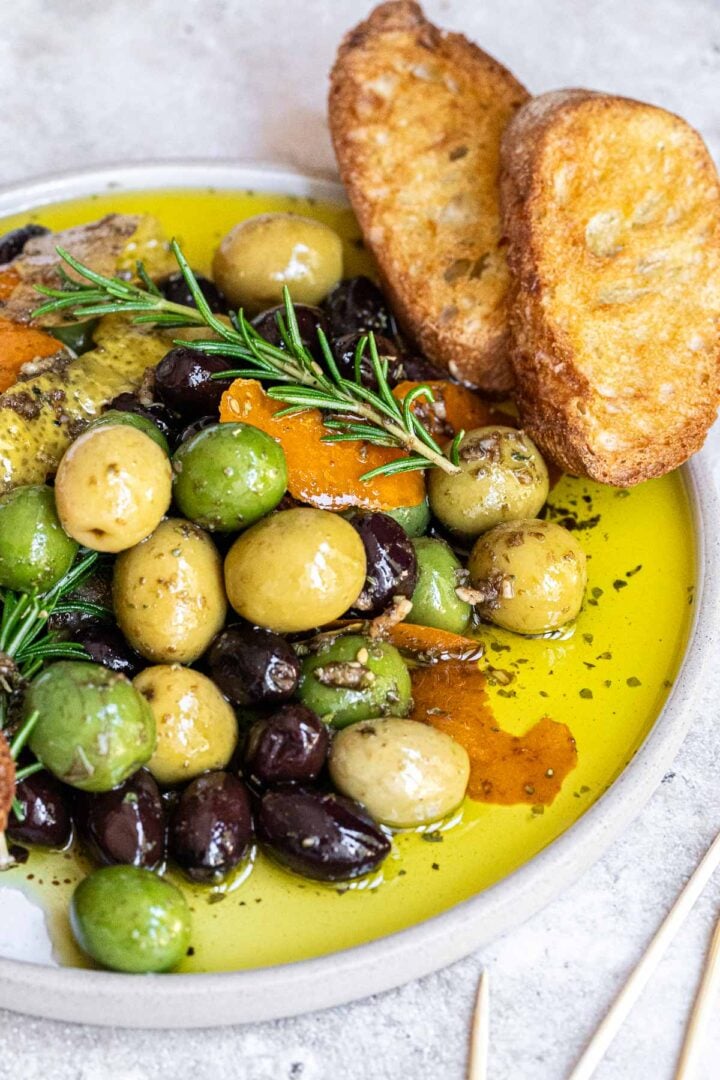 Mediterranean Marinated Olives - Six Hungry Feet